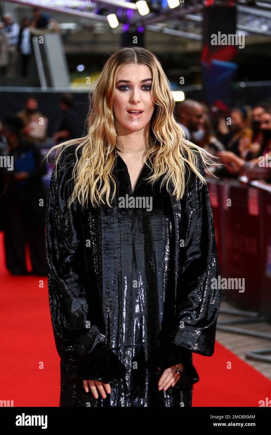 Honor Swinton Byrne poses for photographers upon arrival at the ...