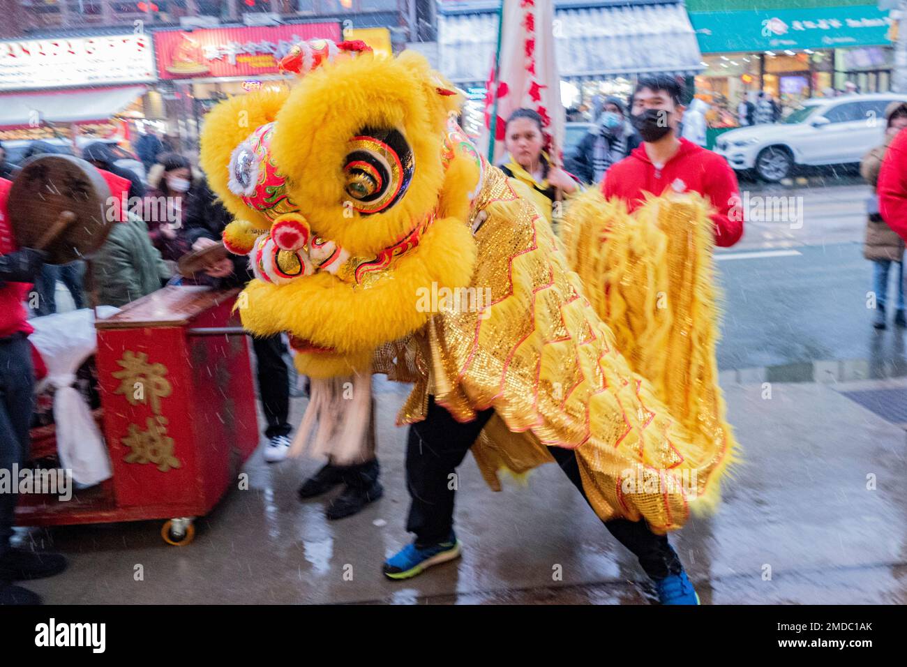 Toronto, Ontario, Canada. 23rd Jan, 2023. A lion dance team goes into ...
