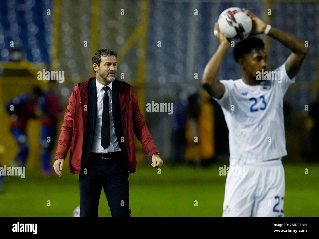 Panama's coach Thomas Christiansen, left, instructs his players during ...