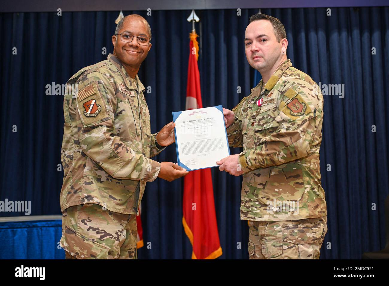 Col. Christopher Robinson (left), 39th Mission Support Group commander ...
