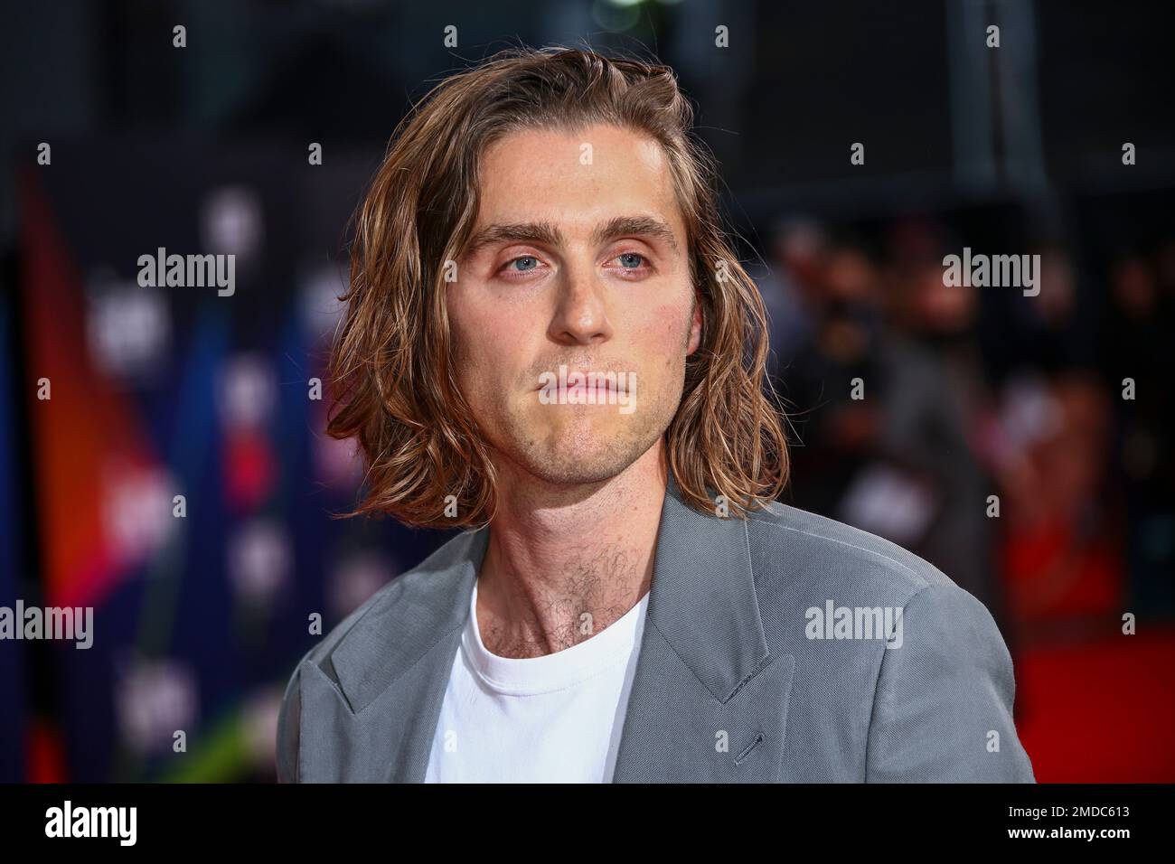 Jack Farthing poses for photographers upon arrival at the premiere of ...
