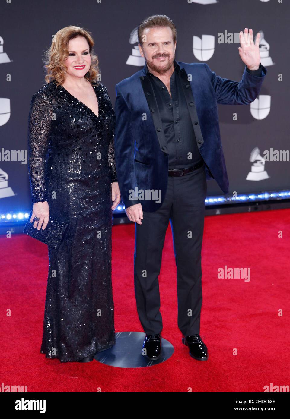 FILE - Joaquin Galan, right, and Lucia Galan, of Pimpinela, arrive at ...