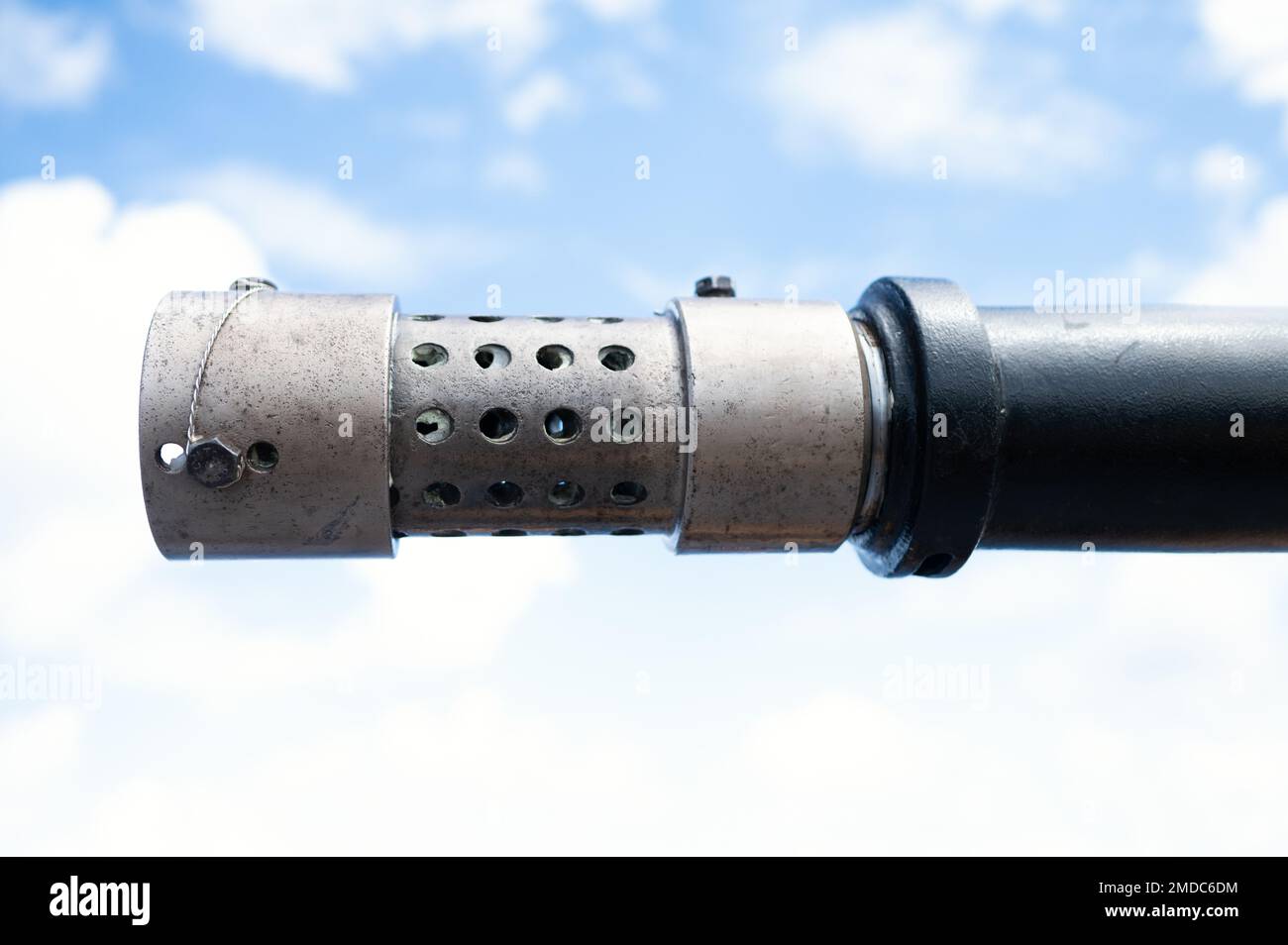 A detail shots shows the muzzle of MK 75 that is mounted on the focsle ...