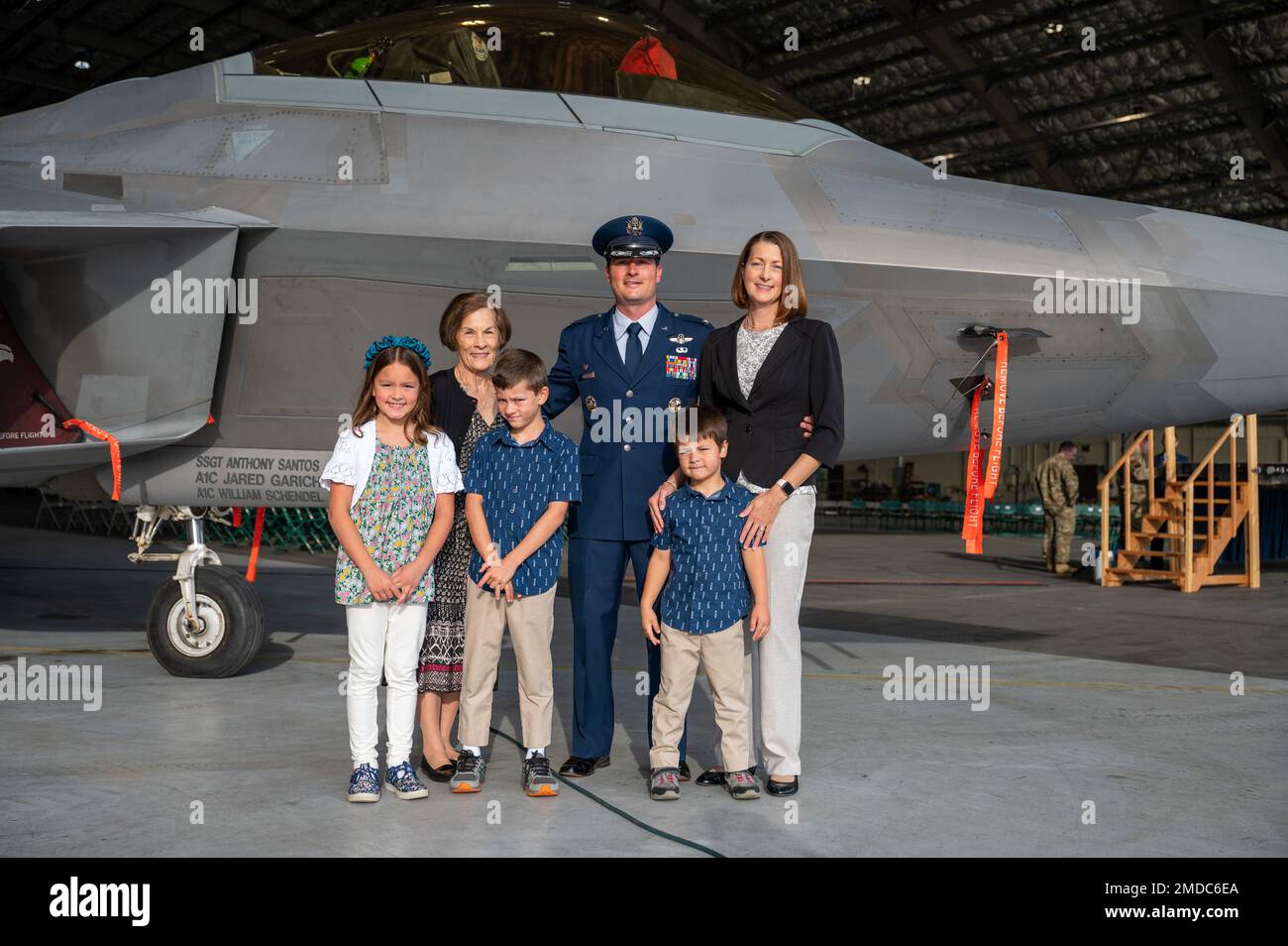 U.S. Air Force Col. Kevin Jamieson, the 3rd Wing commander, poses for a photo with his family in ...