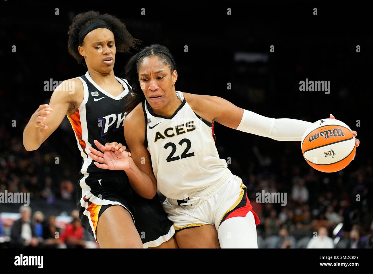 Las Vegas Aces forward A'ja Wilson (22) drives on Phoenix Mercury ...