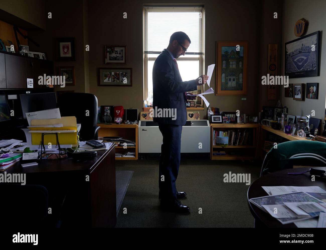 Rockford Mayor Tom McNamara poses for a portrait while looking over the ...