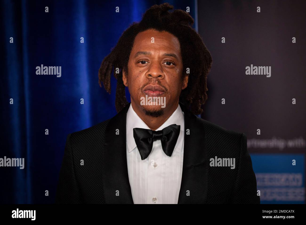 Jay Z poses for photographers upon arrival at the opening of the London ...