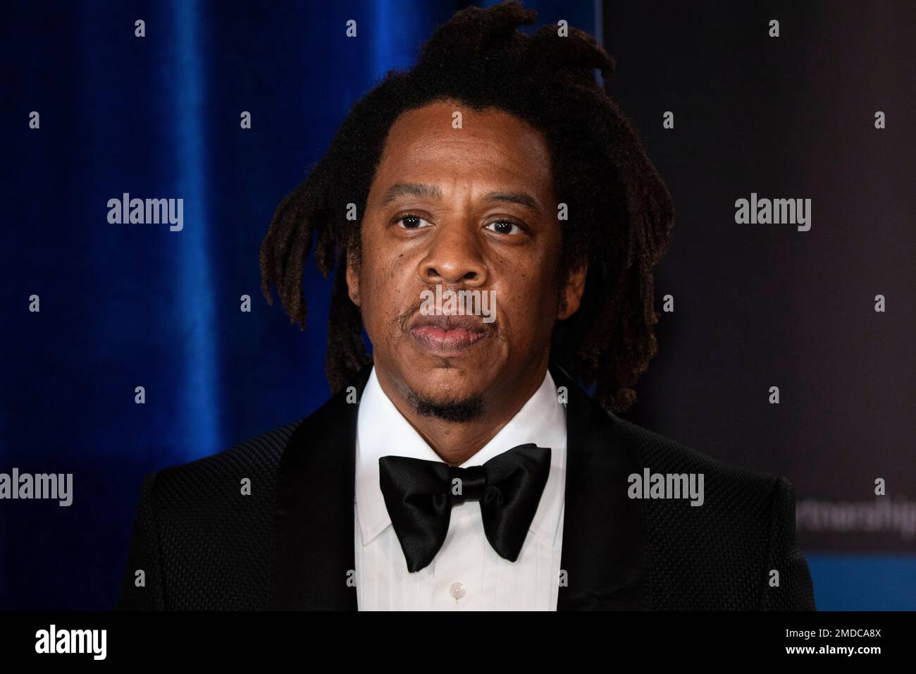 Jay Z poses for photographers upon arrival at the opening of the London ...