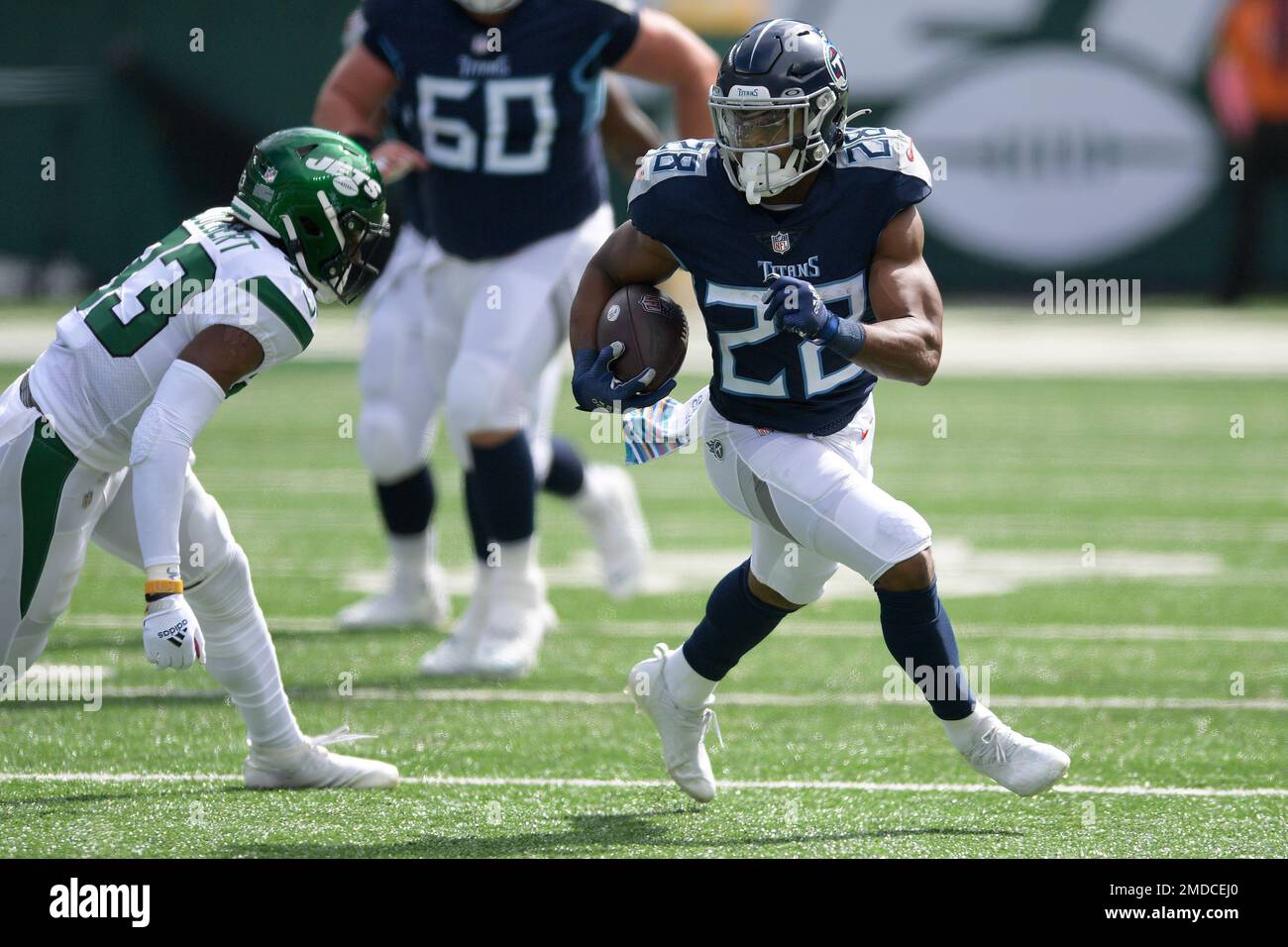 Tennessee Titans running back Derrick Henry (22) makes a move to get by ...