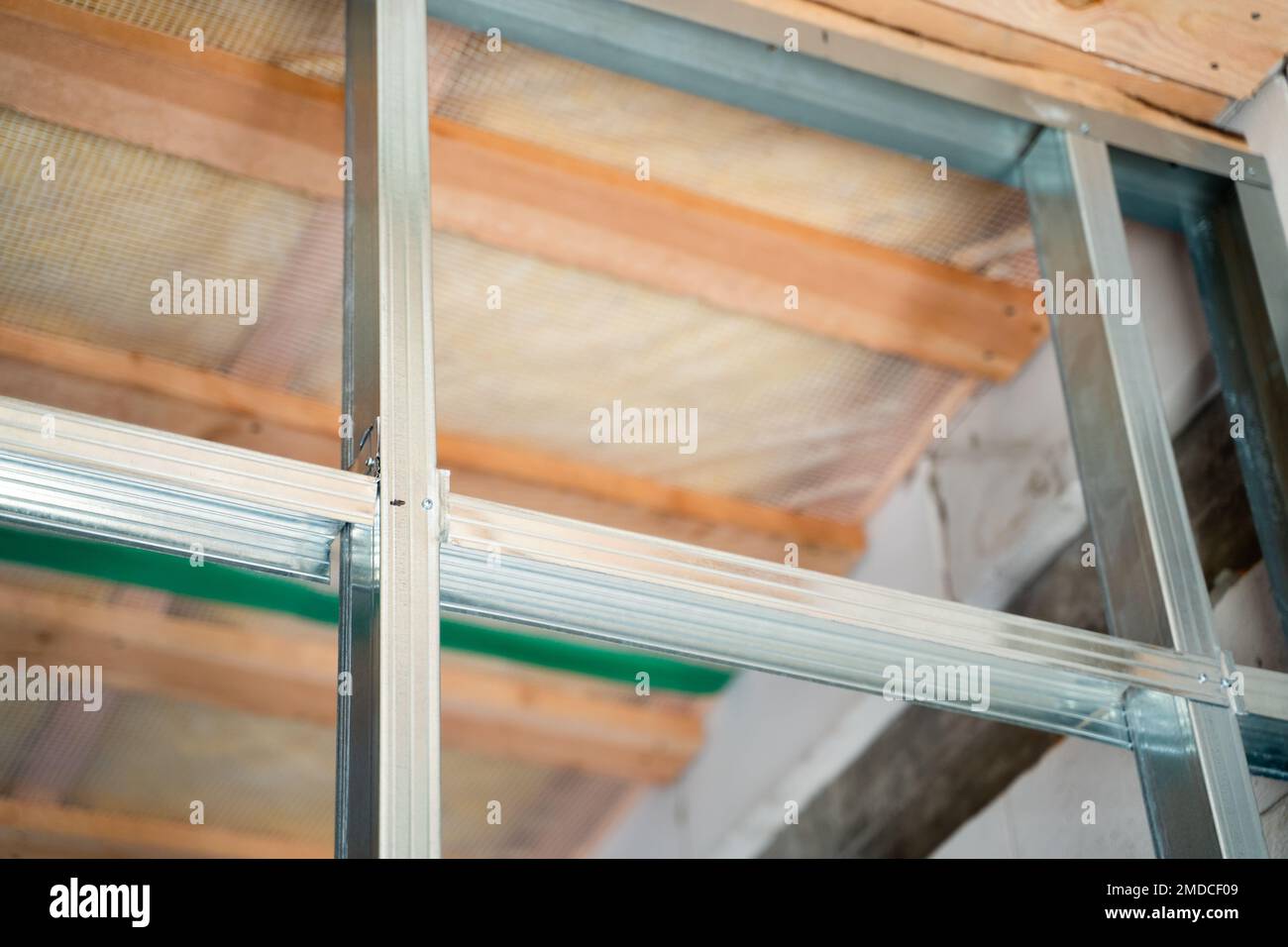 Frame from a metal profile for drywall close-up on a blurred background ...