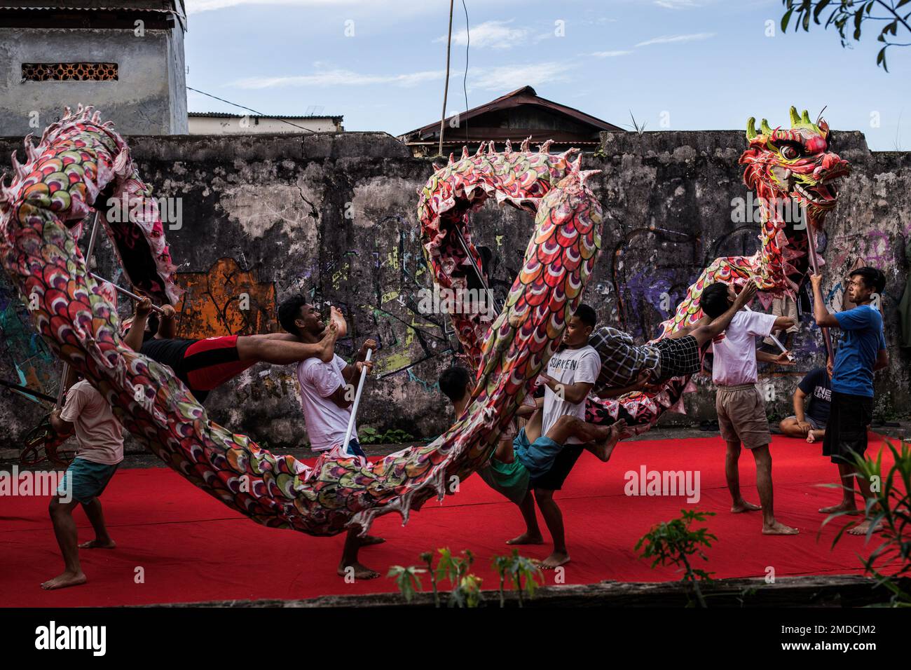 Bogor, Indonesia. 09th Jan, 2023. Members of a dragon dance troupe take ...