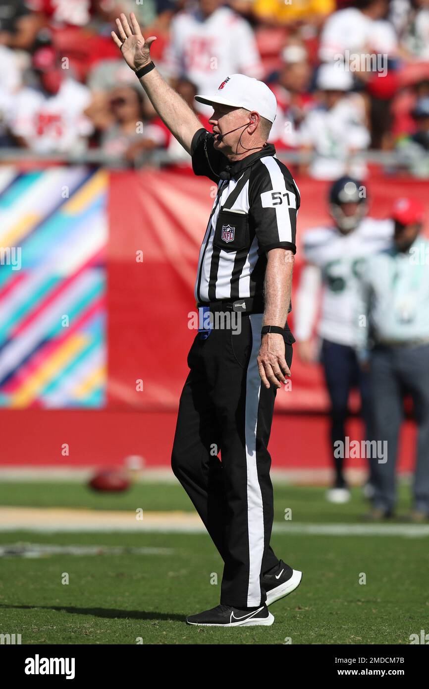 Referee Carl Cheffers (51) signals during an NFL football game between ...