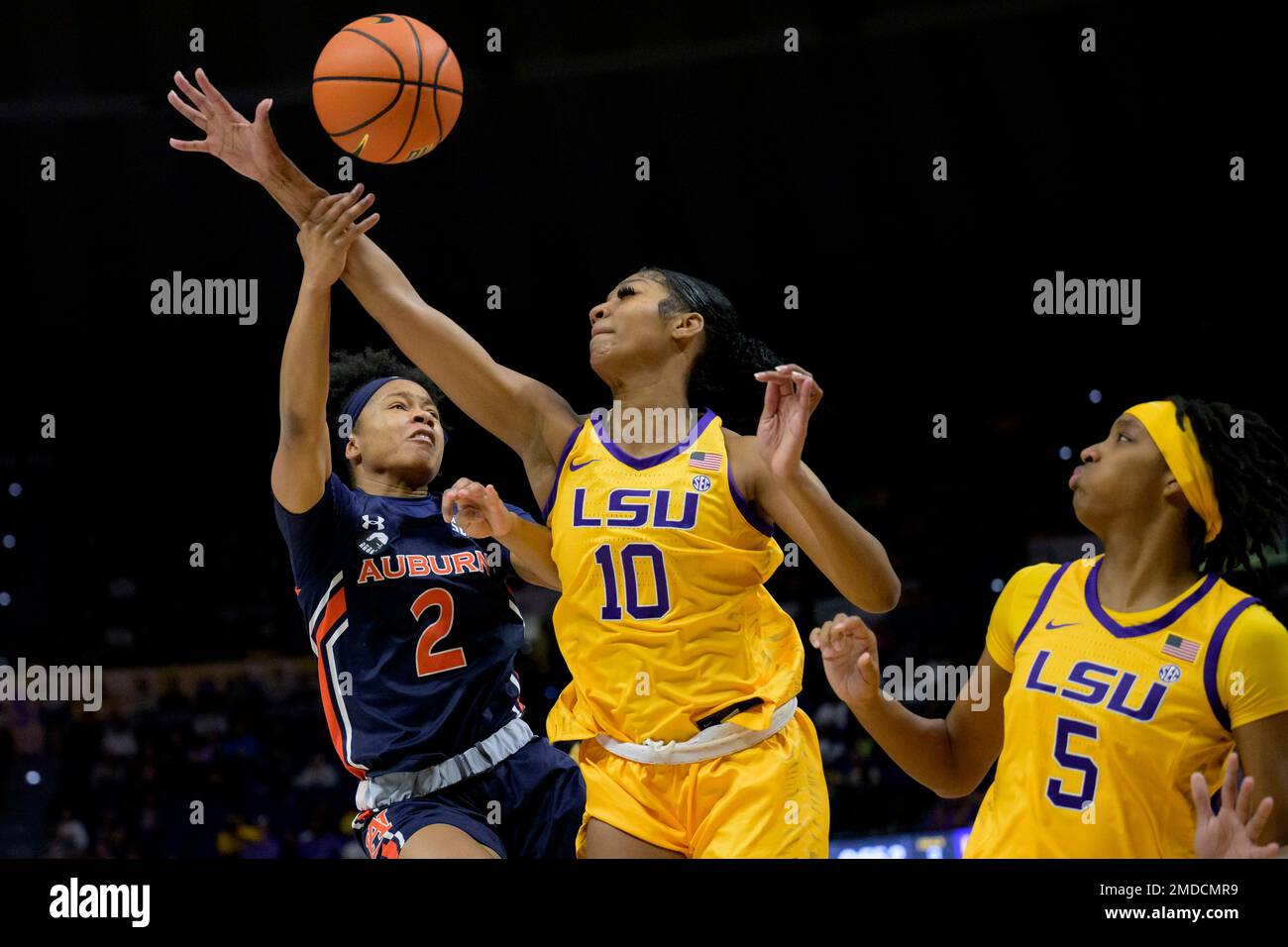 Auburn guard Sania Wells (2) is fouled by LSU guard Angel Reese (10) in ...