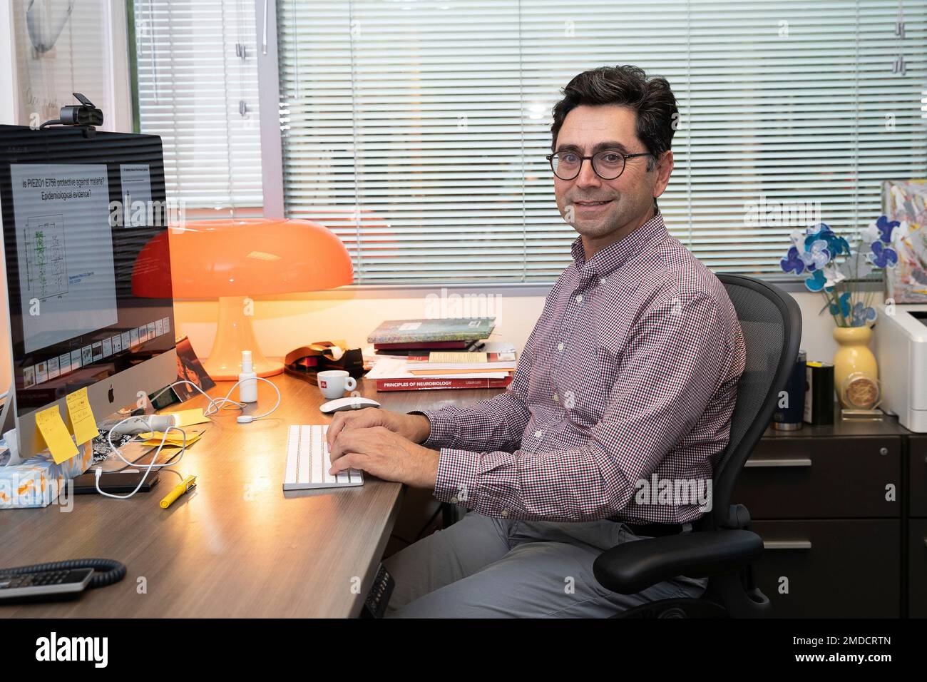 Ardem Patapoutian poses for a portrait in his office at the Dorris ...
