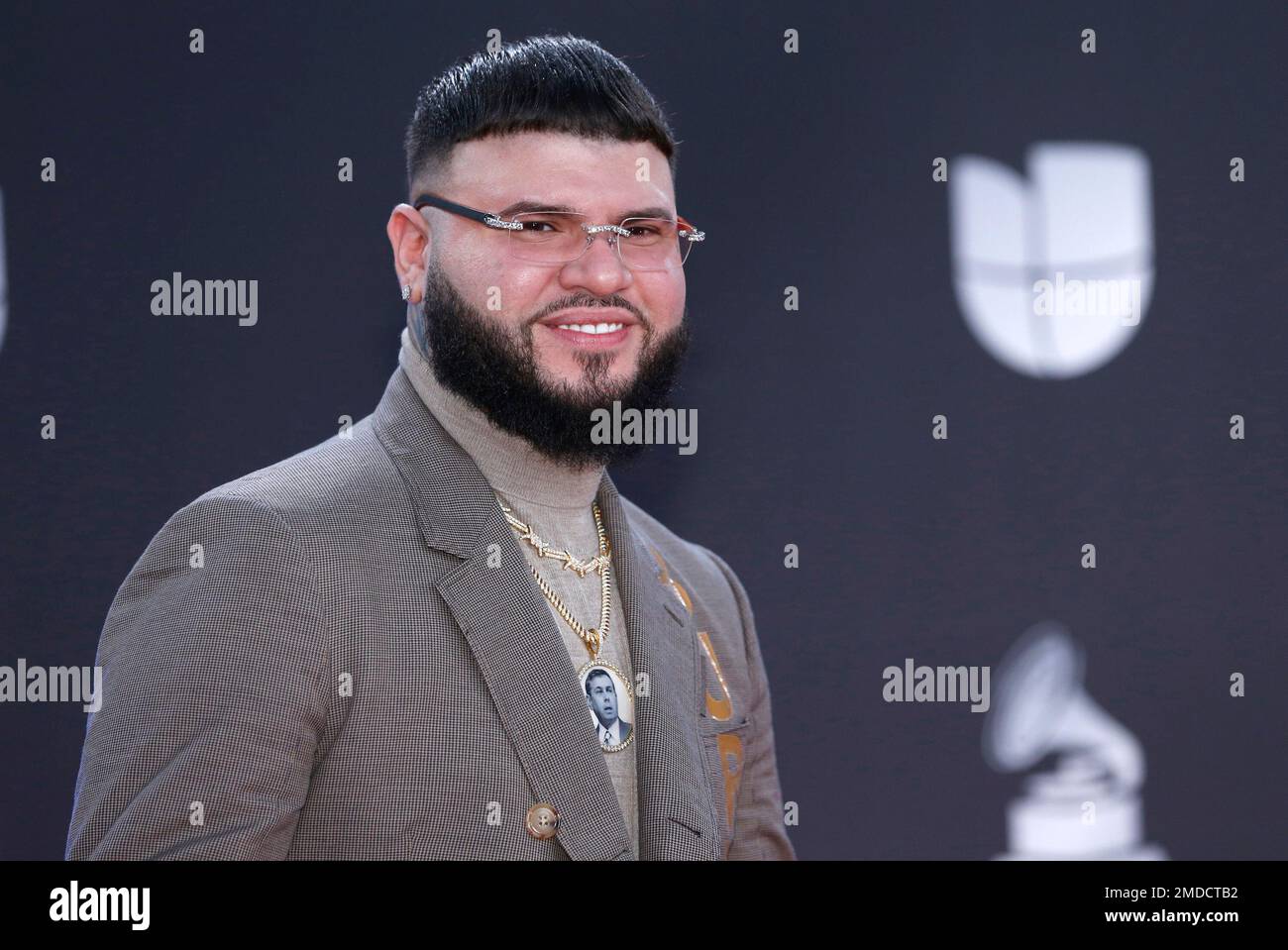 FILE - Farruko arrives at the 20th Latin Grammy Awards on Nov. 14, 2019 ...