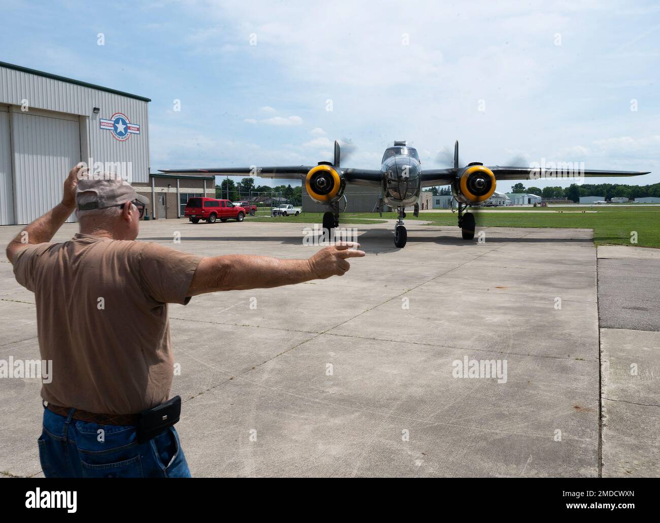 Tom Printz, Champaign Aviation Museum volunteer, directs the B-25 ...
