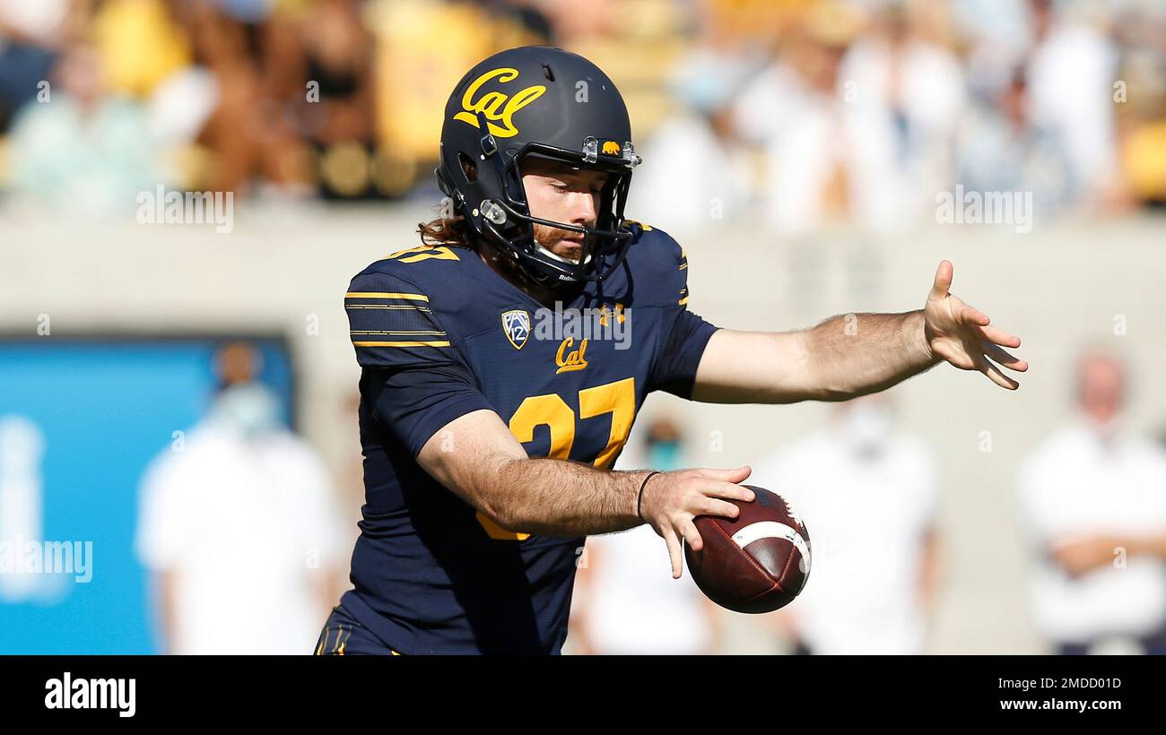 California Golden Bears punter Jamieson Sheahan (37) punts the ball ...
