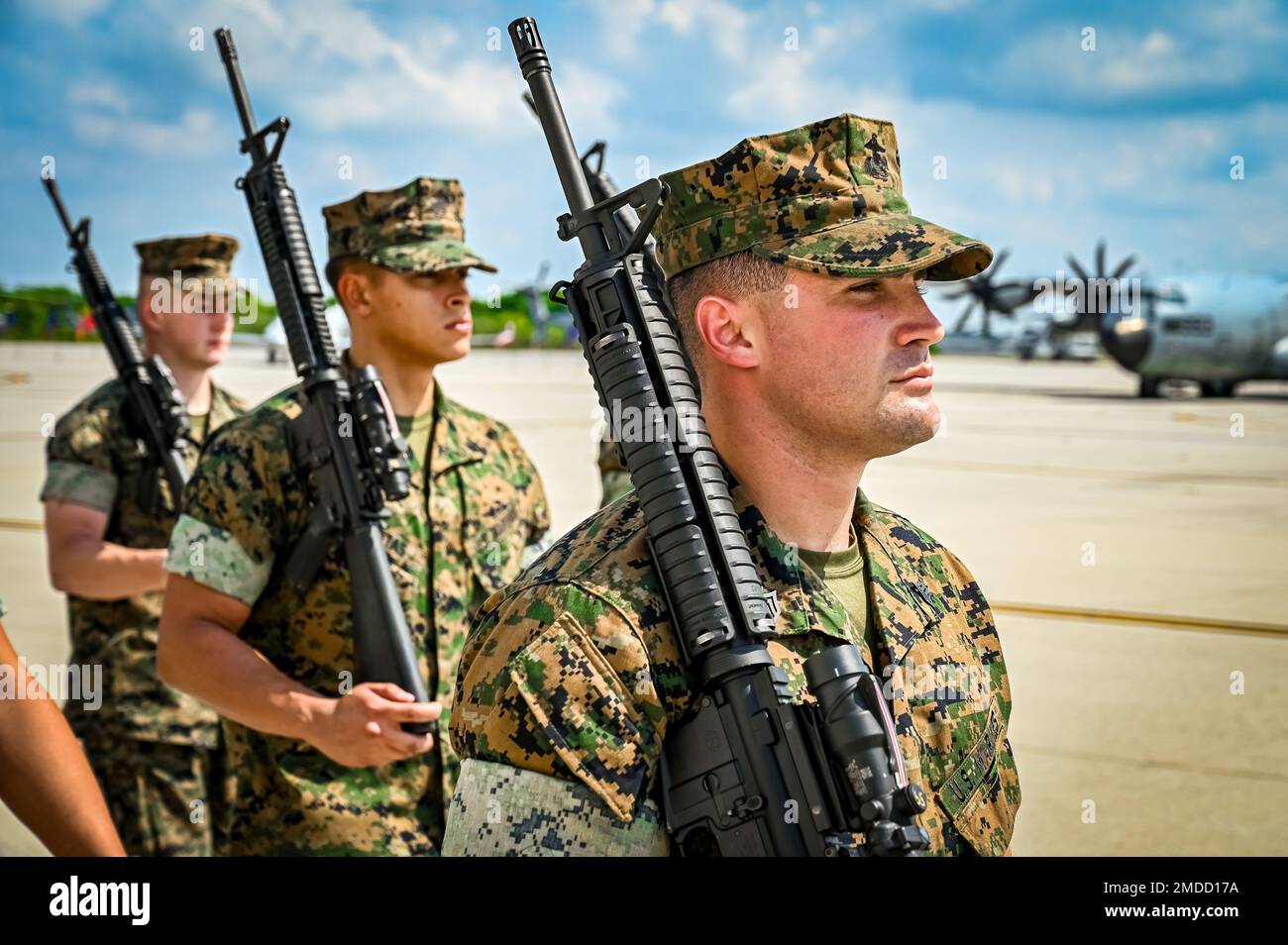 U.S. Marines assigned to Marine Aircraft Group 49 parade march as part ...