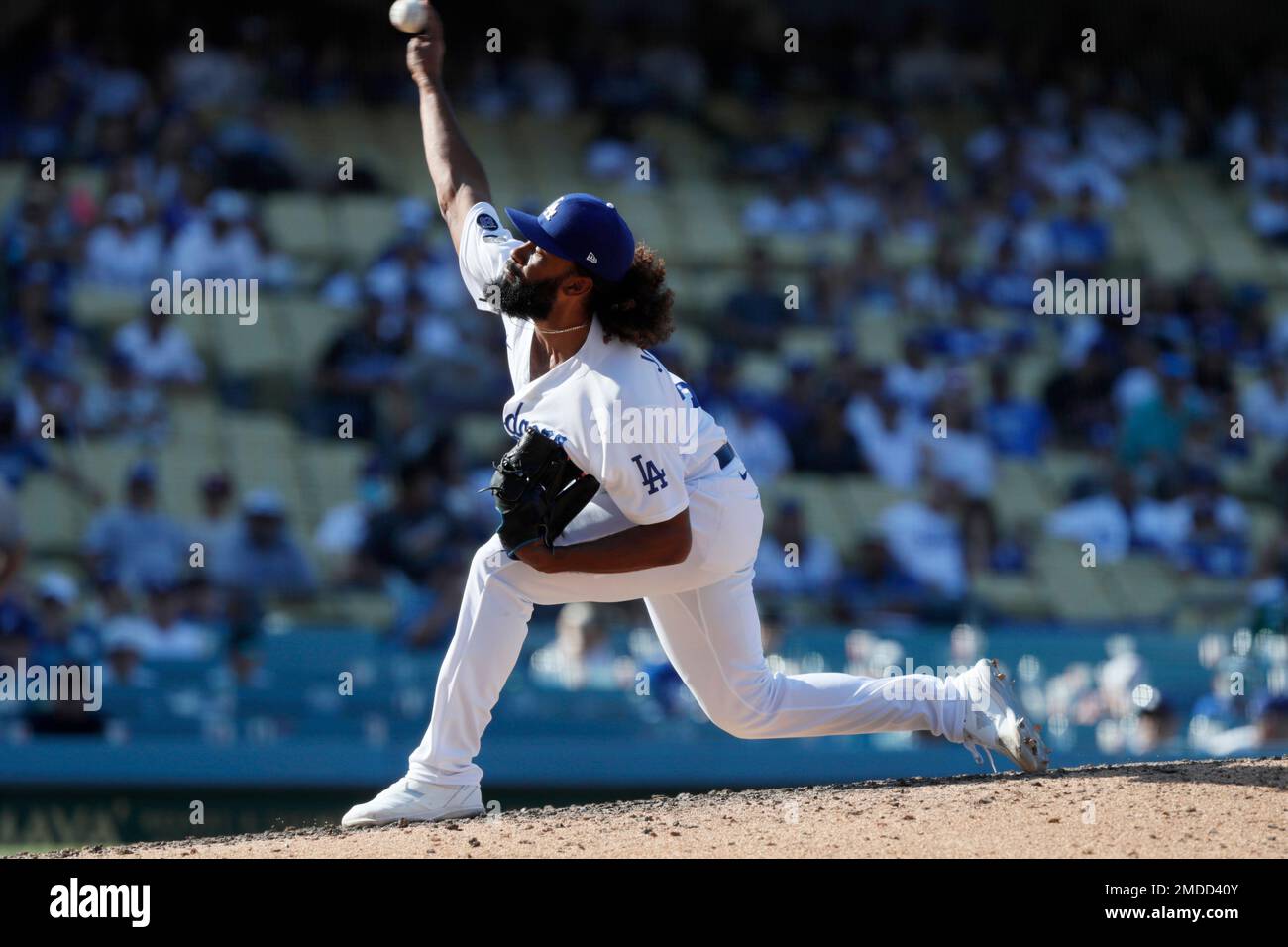 Los Angeles Dodgers relief pitcher Andre Jackson throws to a Milwaukee ...