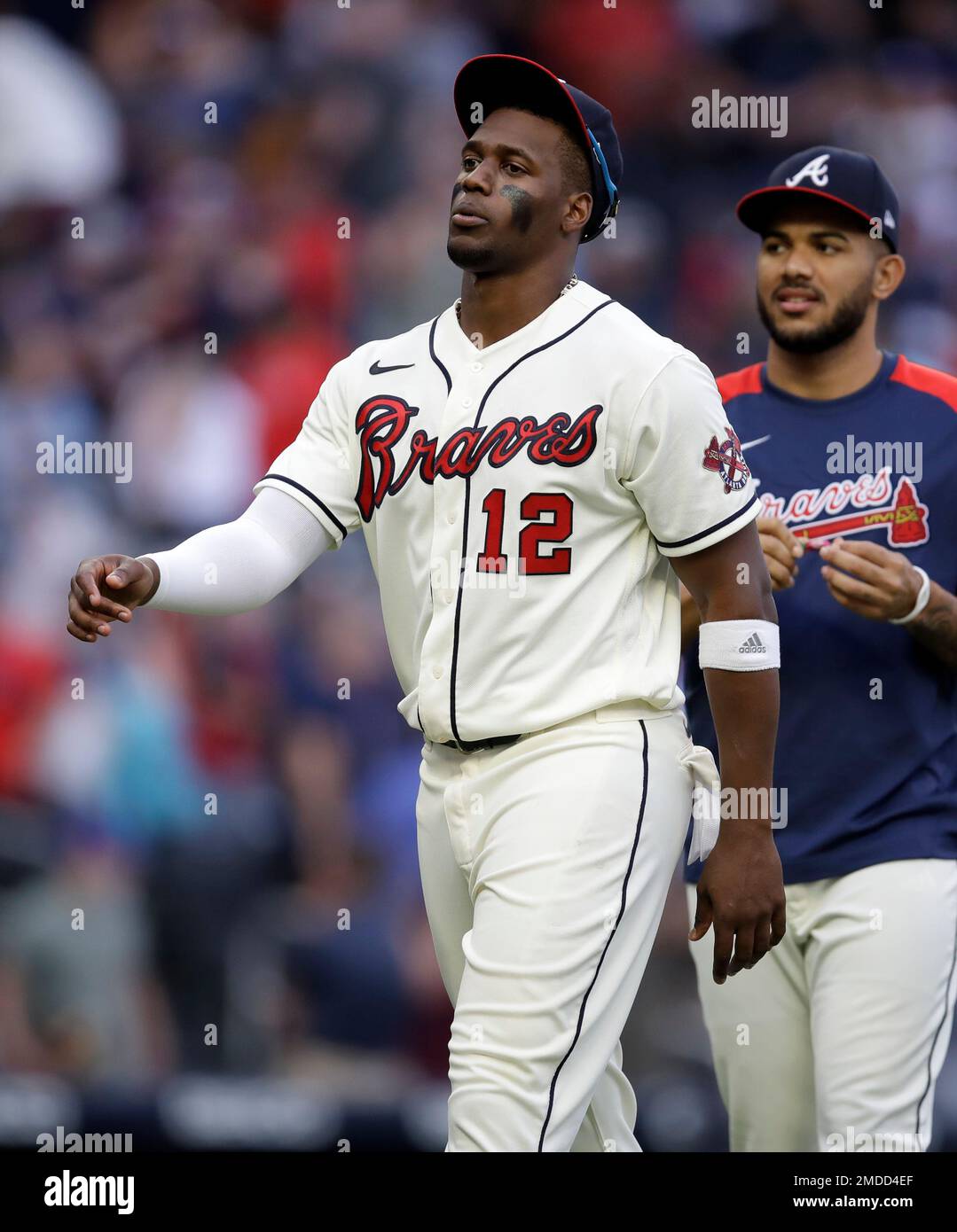 Atlanta Braves' Jorge Soler walks off the field at the end of a ...