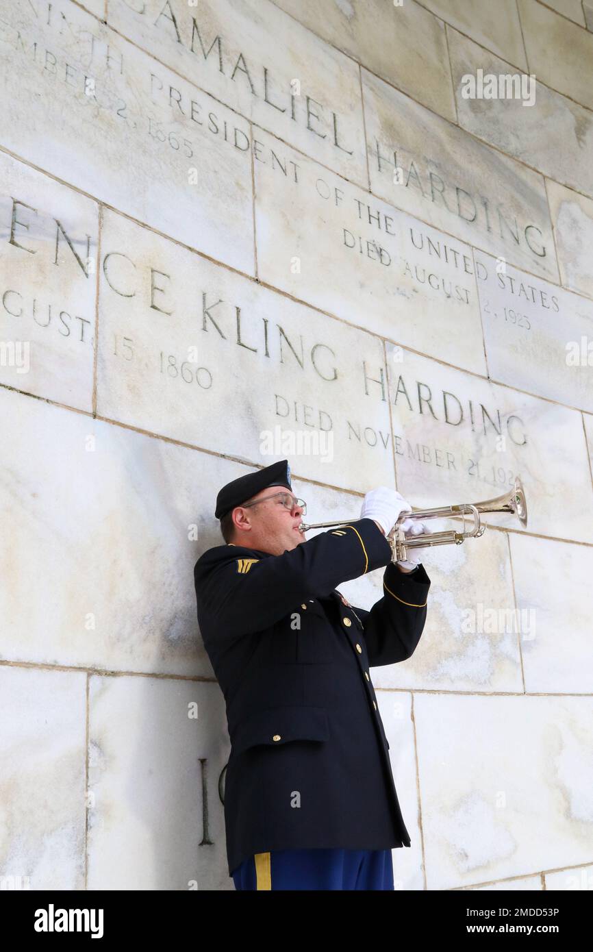 Staff Sgt. David Lambermont, bugler, 338th Army Band, plays Taps during ...