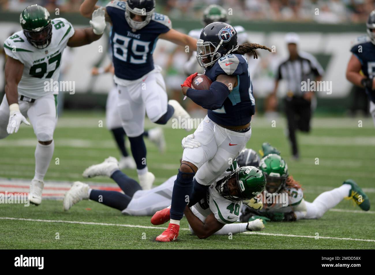 Tennessee Titans running back Derrick Henry (22) is tackled by New York ...
