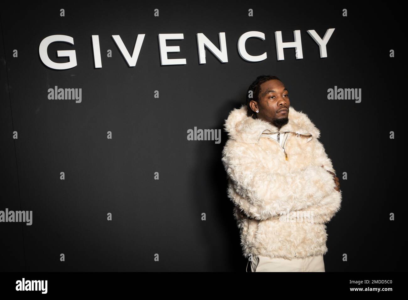 Offset poses for photographers prior to the Givenchy Spring-Summer 2022 ...