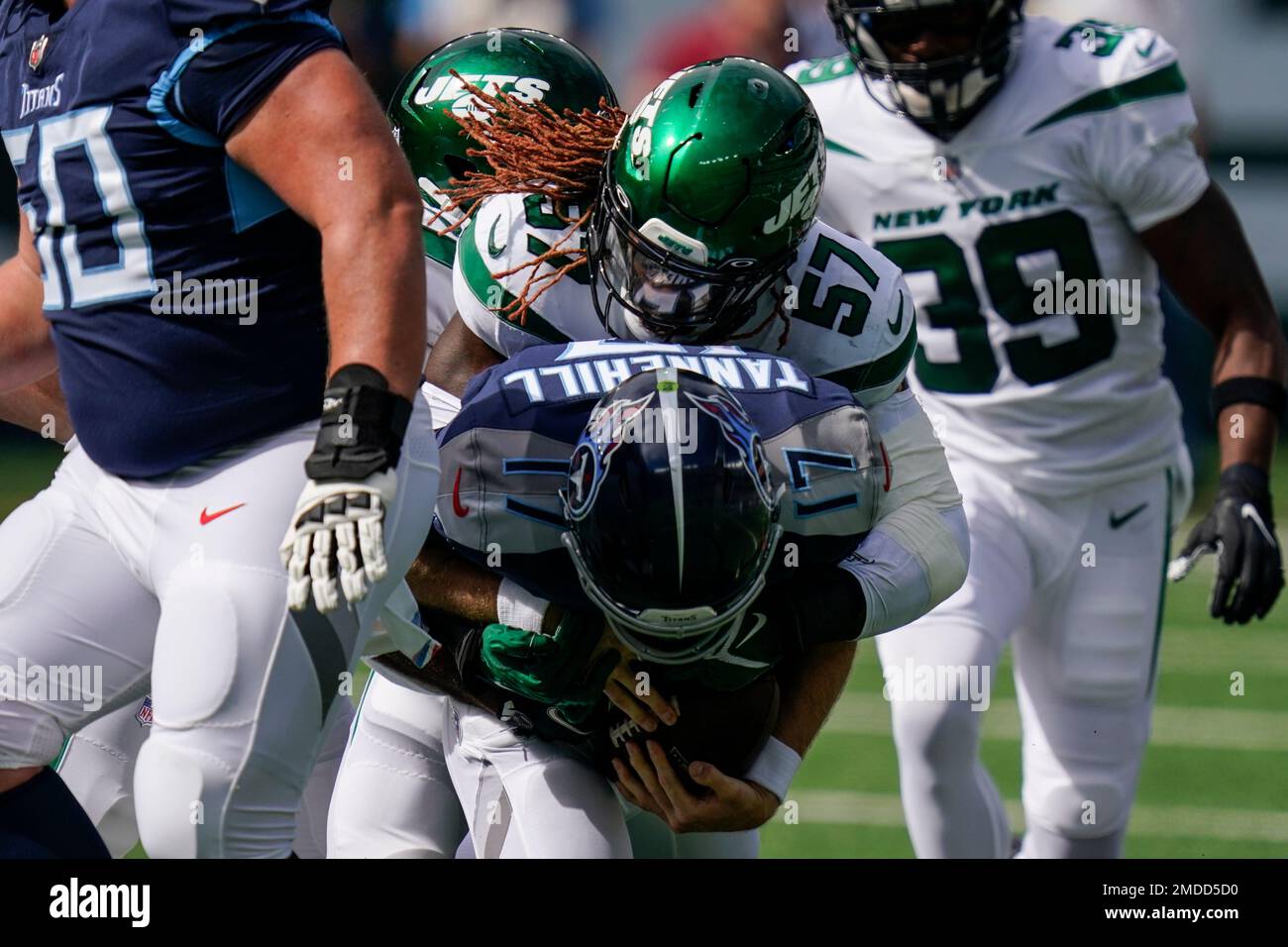 Tennessee Titans quarterback Ryan Tannehill (17) is sacked by New York ...