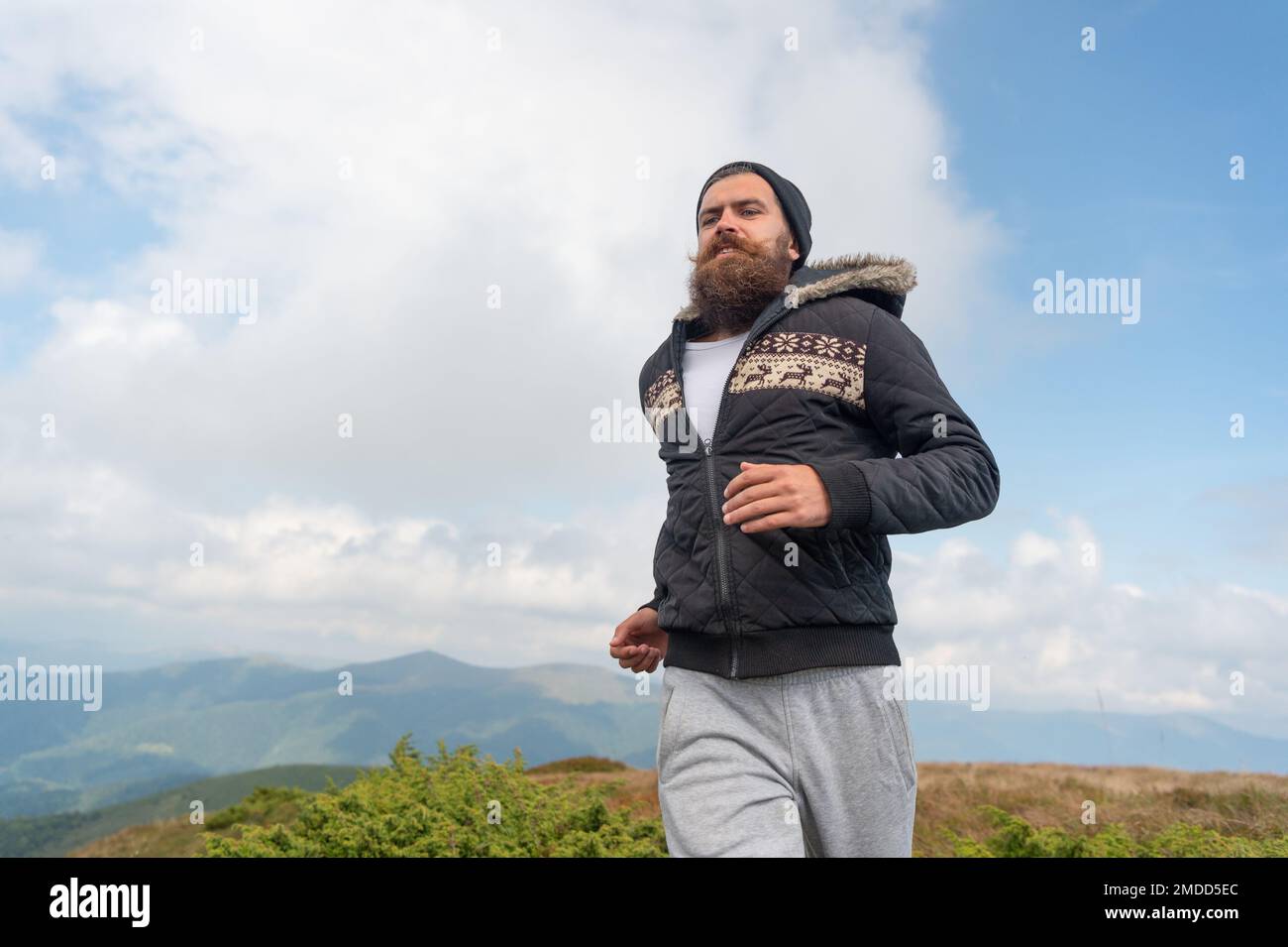bearded runner man running outdoor. runner man running outside Stock ...