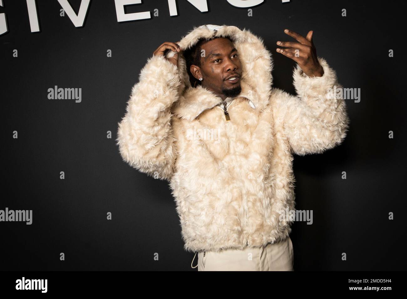 Offset poses for photographers prior to the Givenchy Spring-Summer 2022 ...