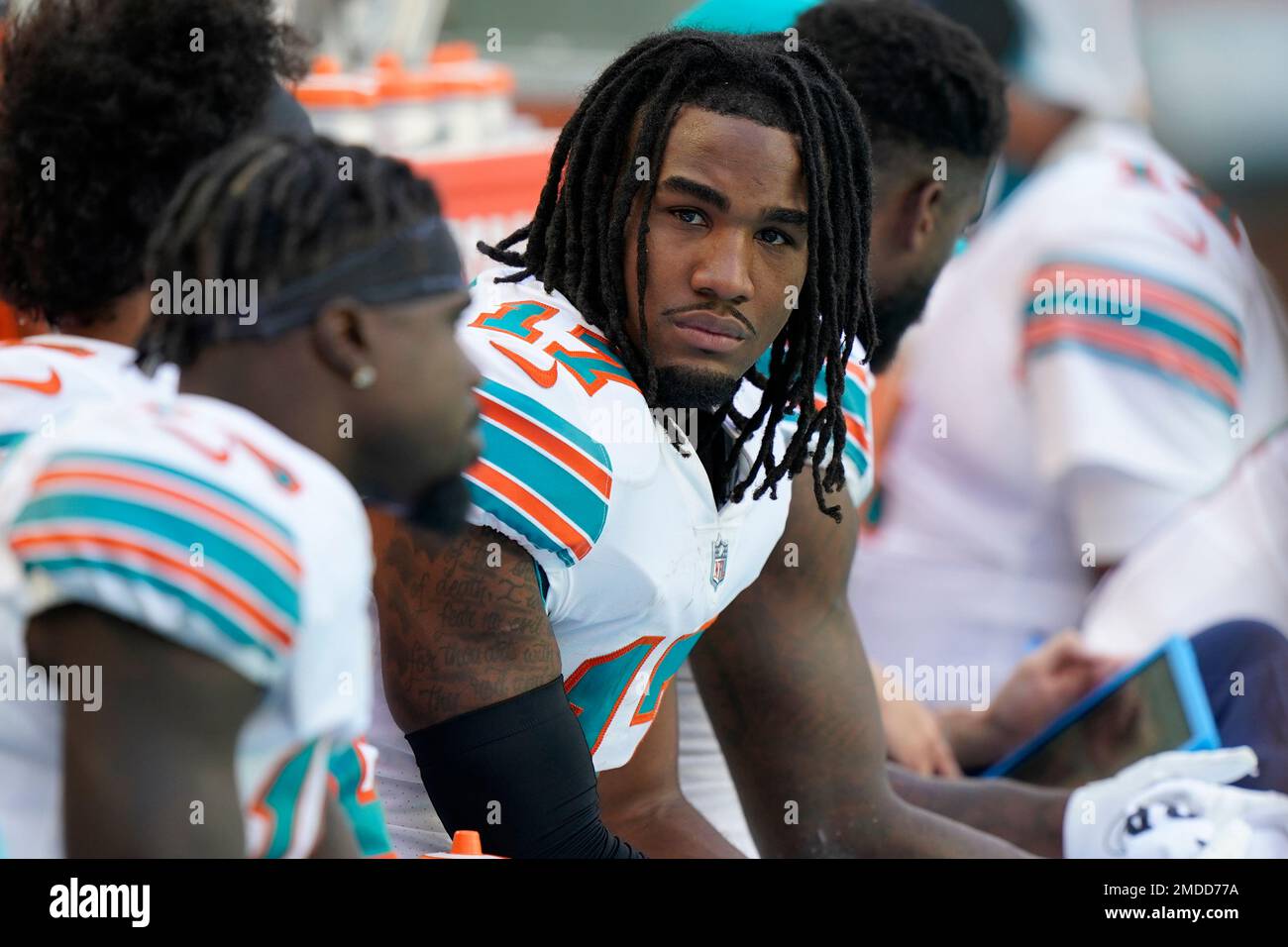 Miami Dolphins wide receiver Jaylen Waddle (17) sits on the sidelines ...