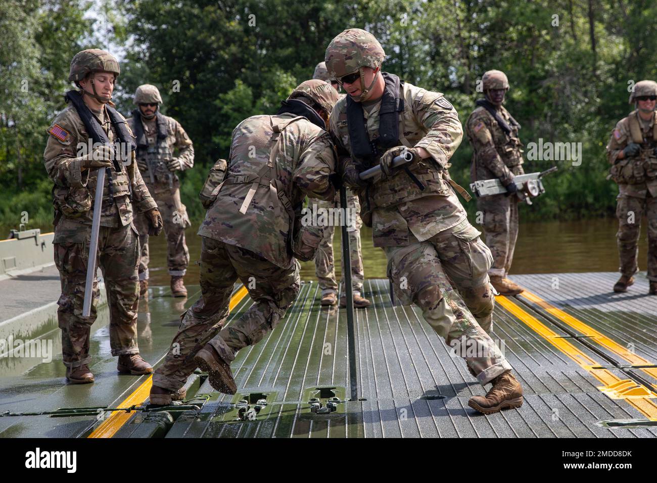 Pfc. Austin Veronen and Spc. Brennan Sorensen, both bridge builder ...