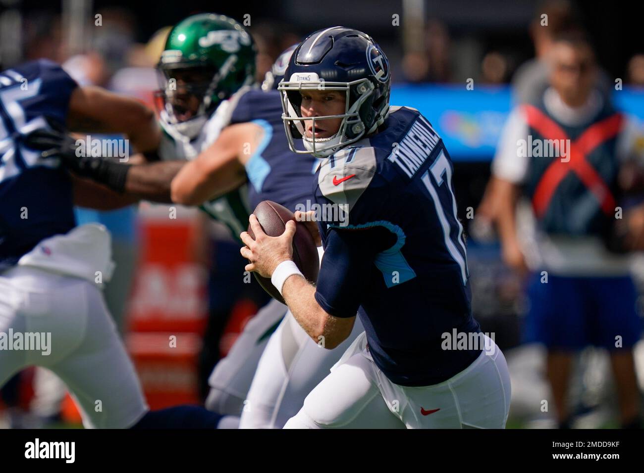 Tennessee Titans quarterback Ryan Tannehill looks to pass on the run in ...