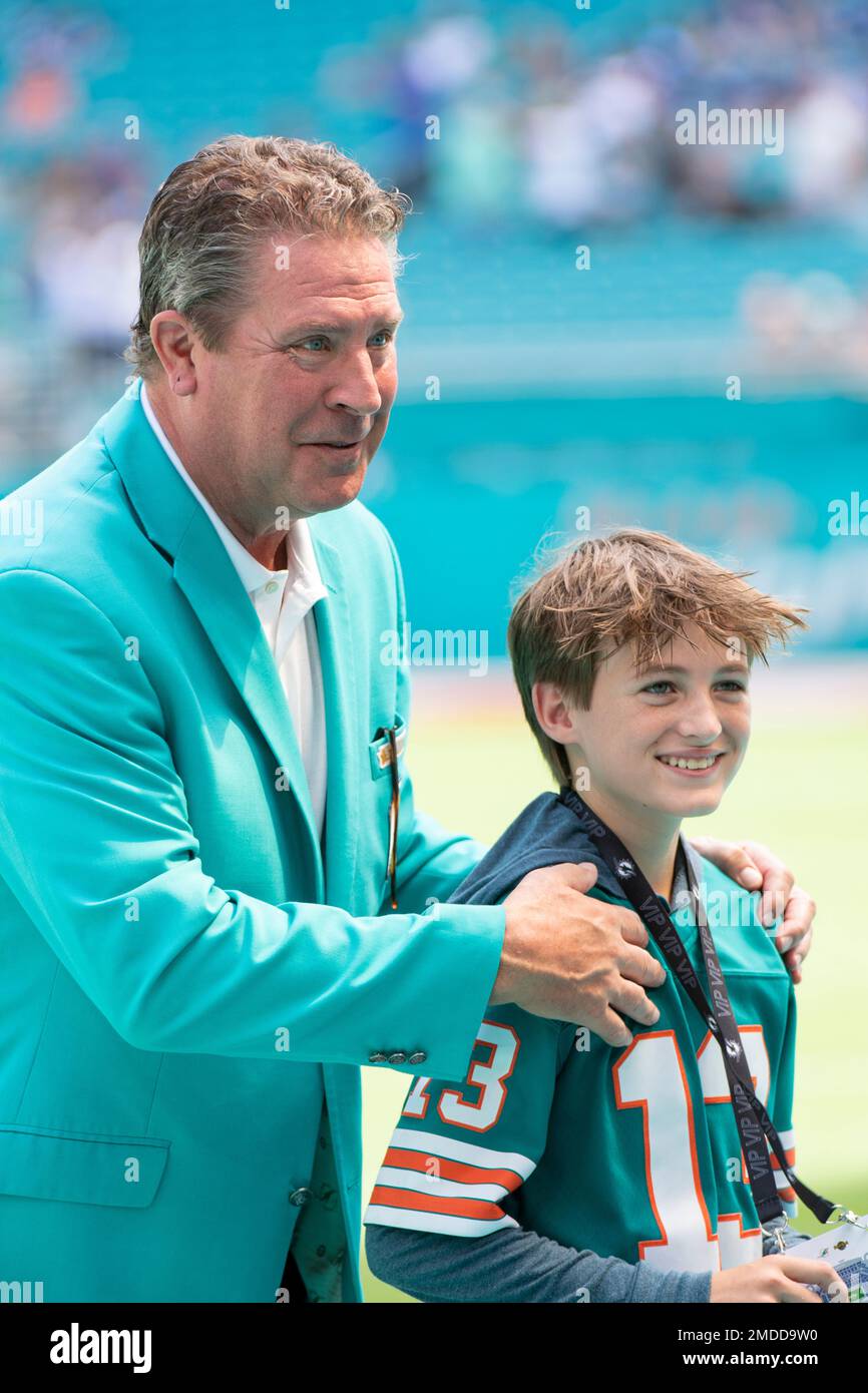 Dan Marino poses with Miller Garfinkel, son of Miami Dolphins CEO Tom ...