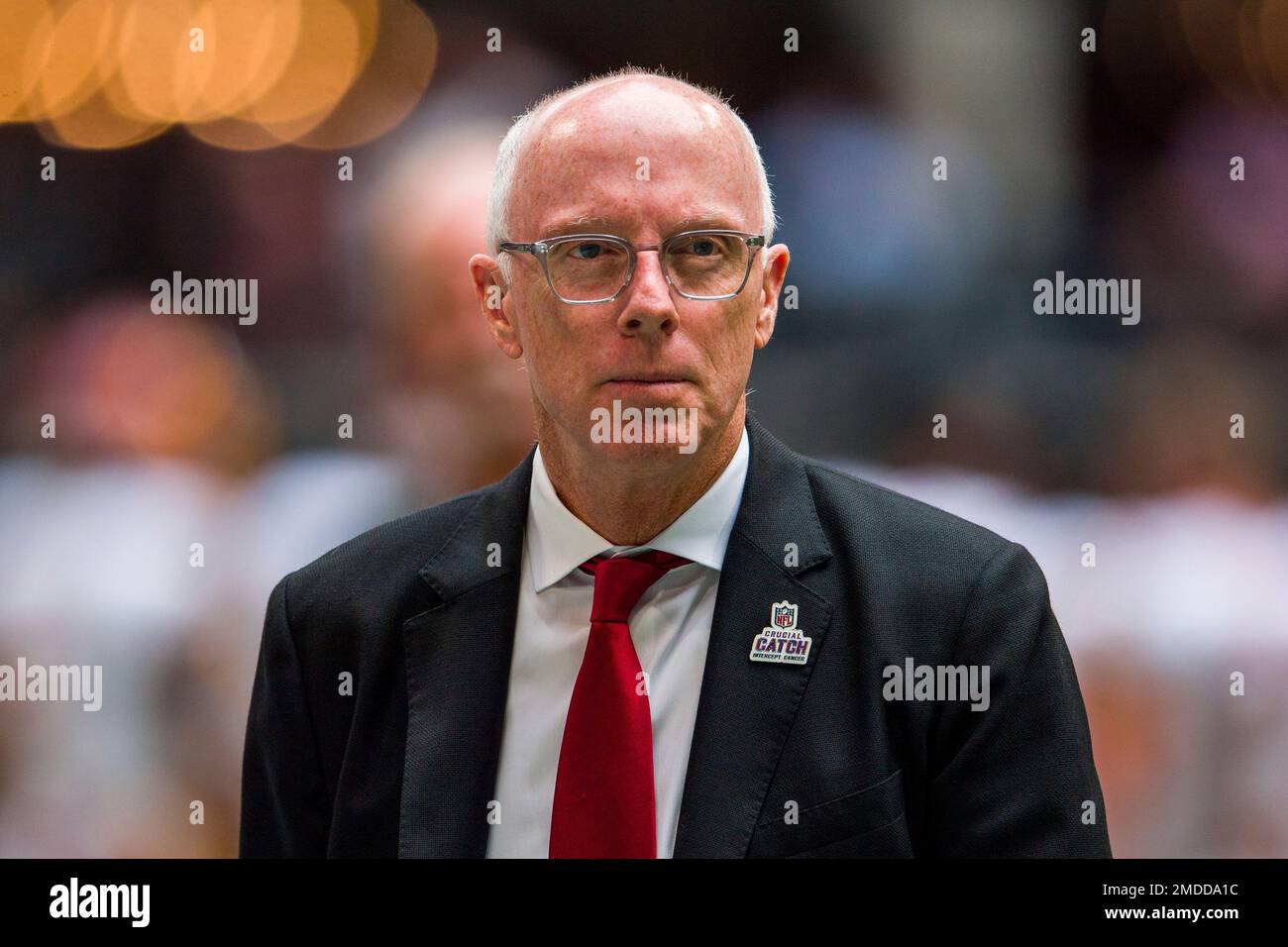 Atlanta Falcons President and CEO Rich McKay wears a Crucial Catch pin ...
