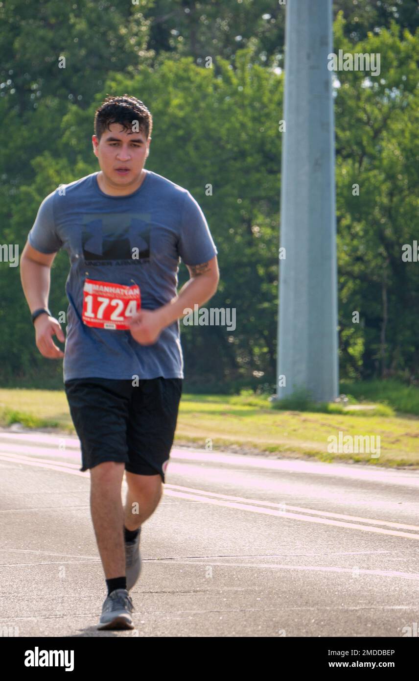 A Soldier with the 1st Infantry Division runs the final stretch of the ...
