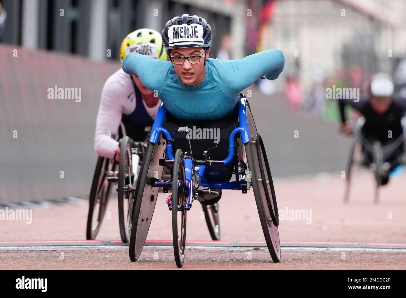 Germany's Merle Menje crosses the finish line to take second place ...