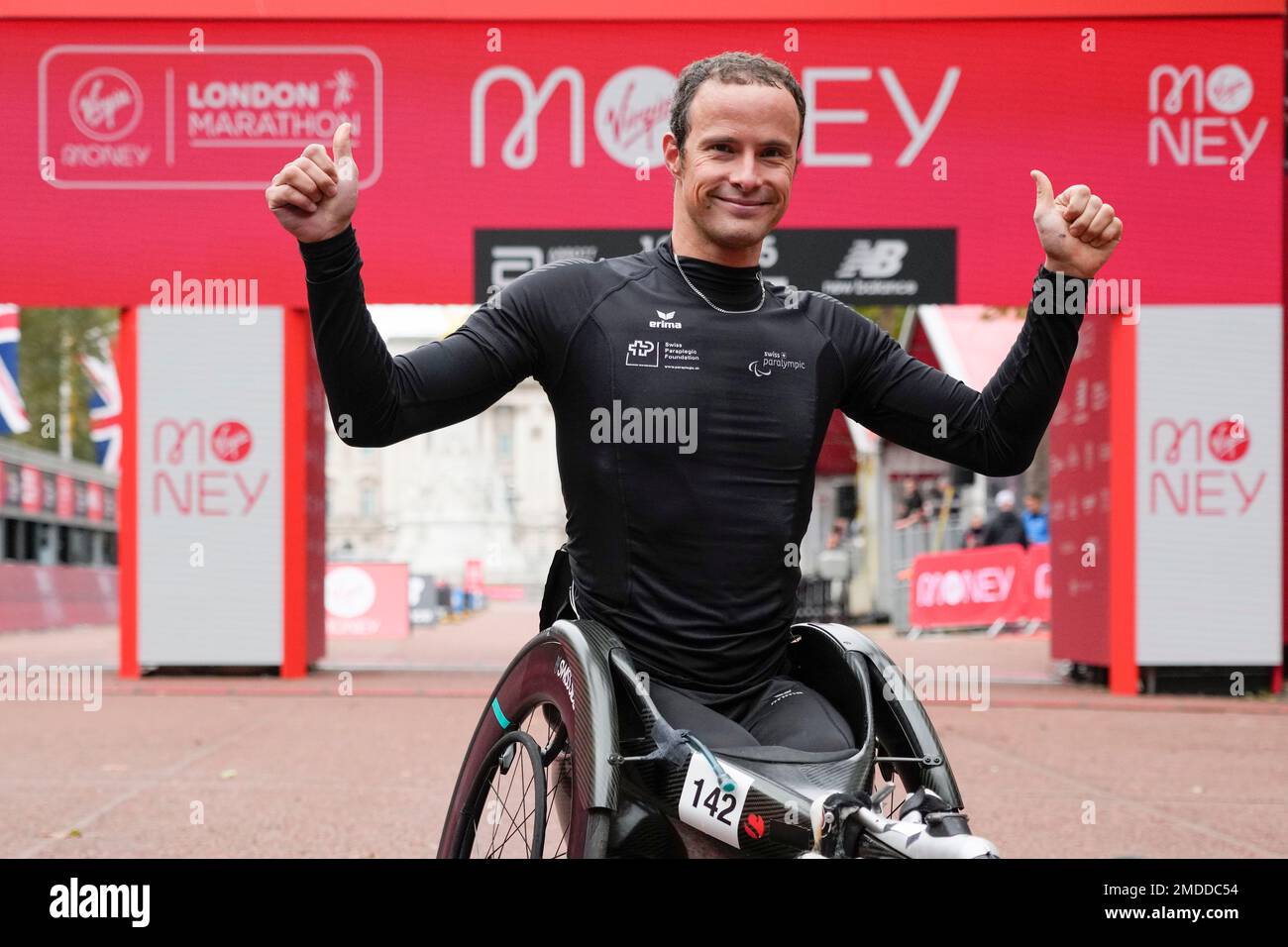 Switzerland's Marcel Hug celebrates winning the Men's Wheelchair race ...