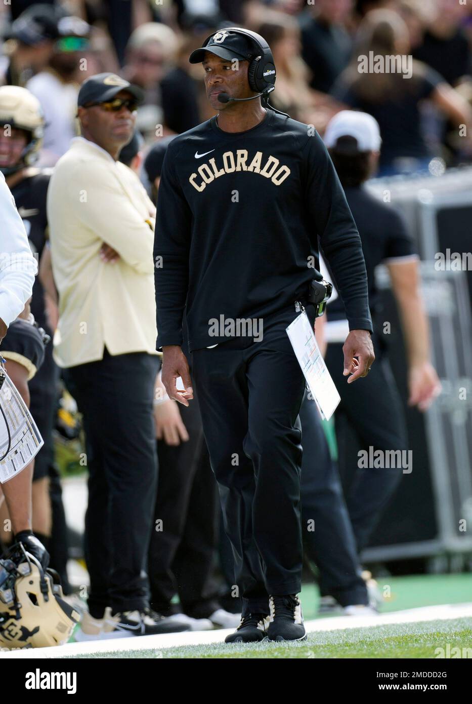 Colorado head coach Karl Dorrell walks the sideline in the first half ...