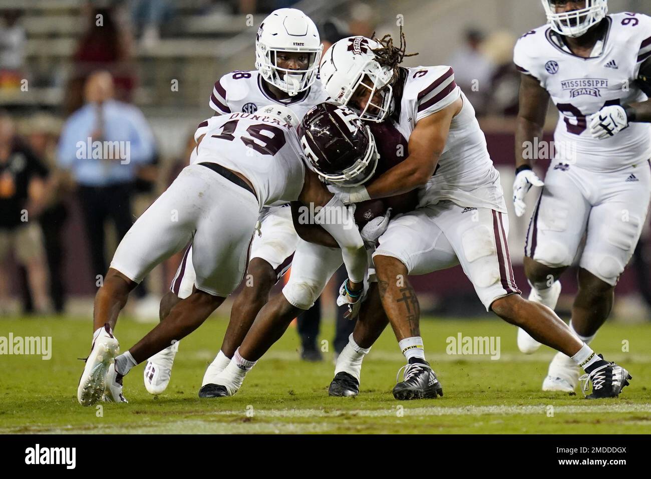 Texas A&M running back Isaiah Spiller (28) is tackled after a short ...