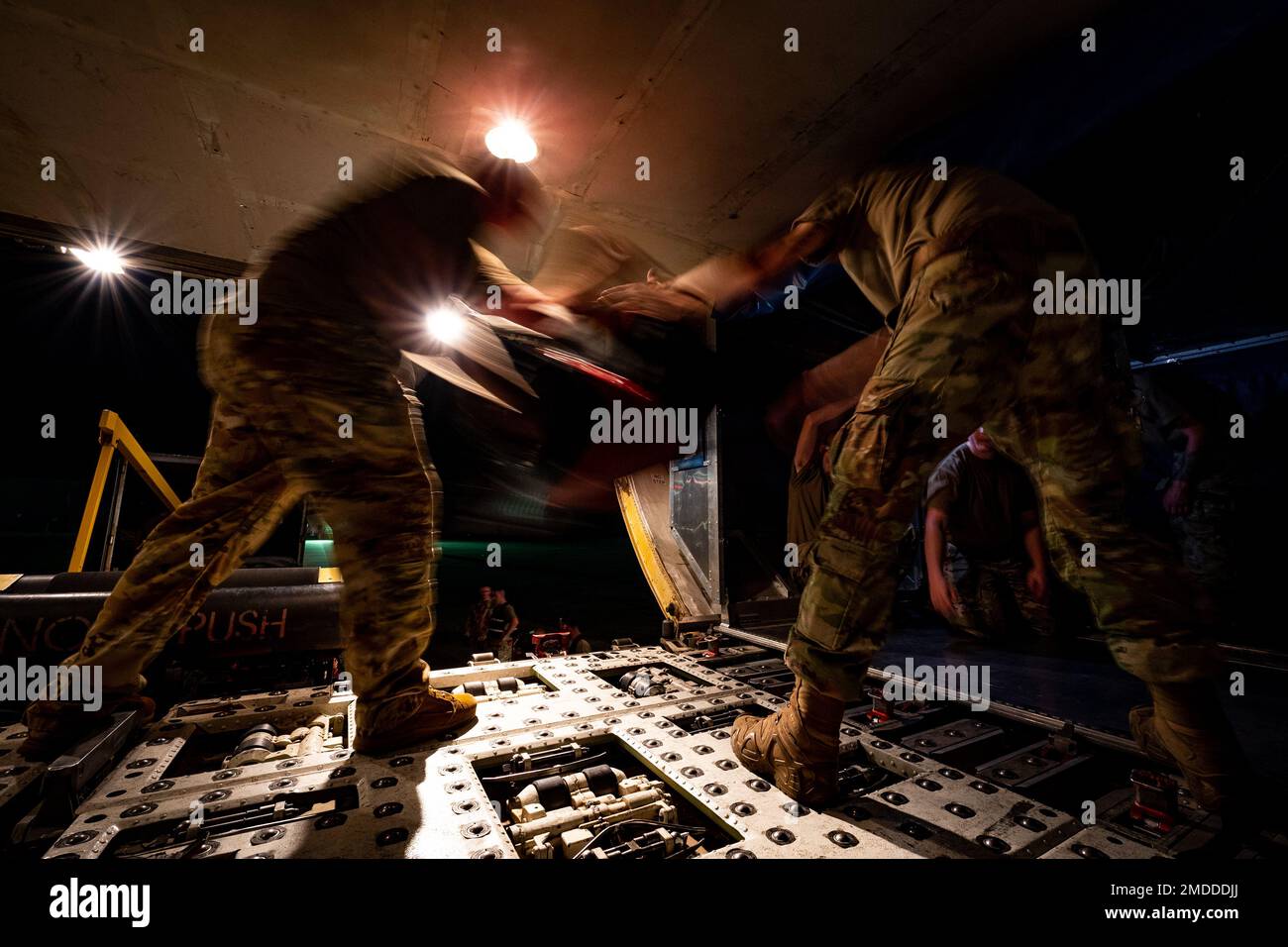 U.S. Air Force 79th Fighter Generation Squadron (FGS) Airmen assist the ...