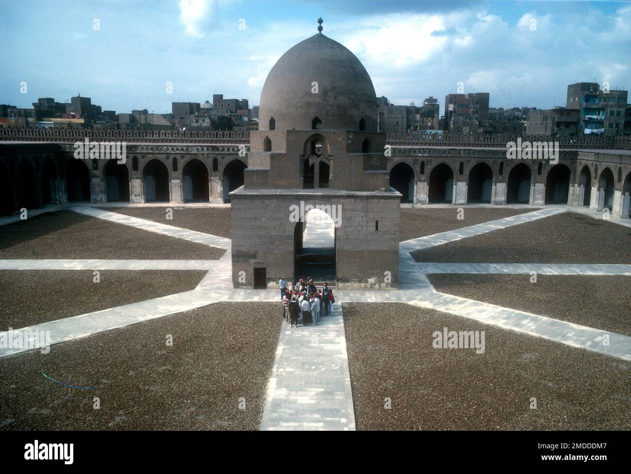 A religious tour group in the courtyard of the Ibn Tulun, 9th century ...