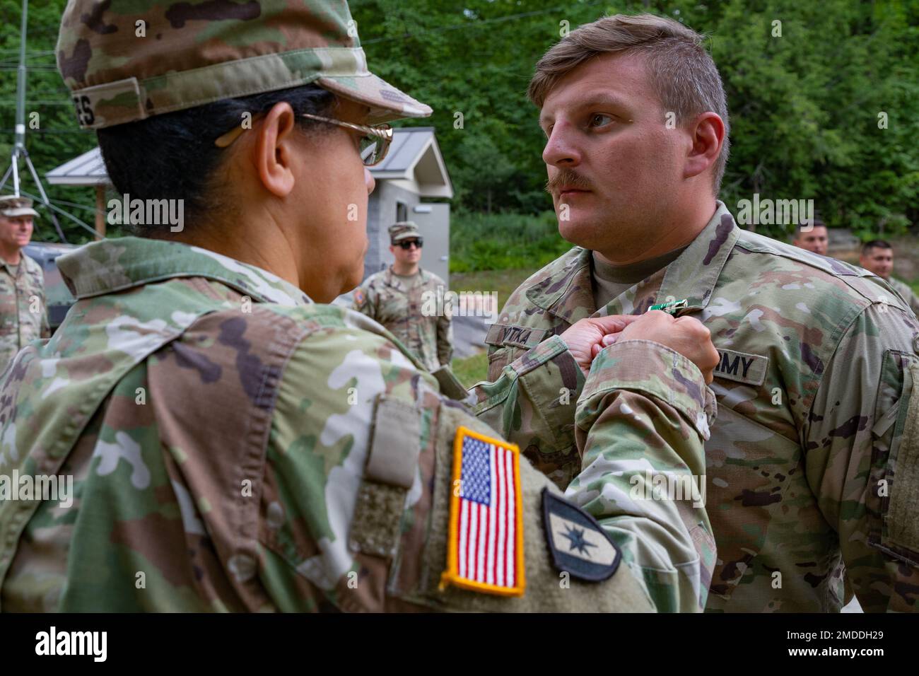 U.S. Army Col. Lesbia Nieves, left, brigade commander of the 85th Troop Command, Connecticut ...