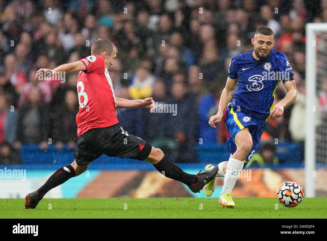 Chelsea's Mateo Kovacic, left, duels for the ball with Southampton's ...