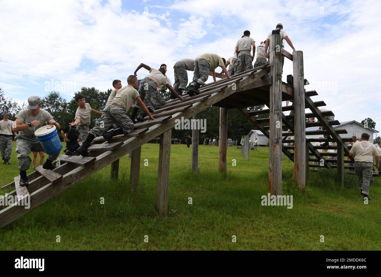 Louisiana Civil Air Patrol cadets participate in an obstacle course at ...