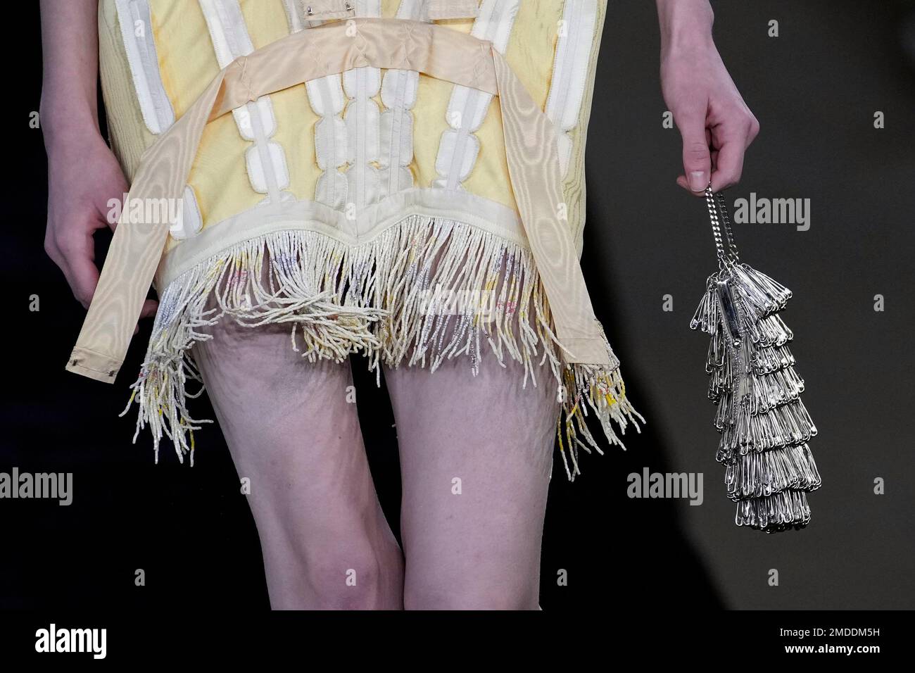 A model wears a creation for Acne Studios Spring-Summer 2022 ready-to ...