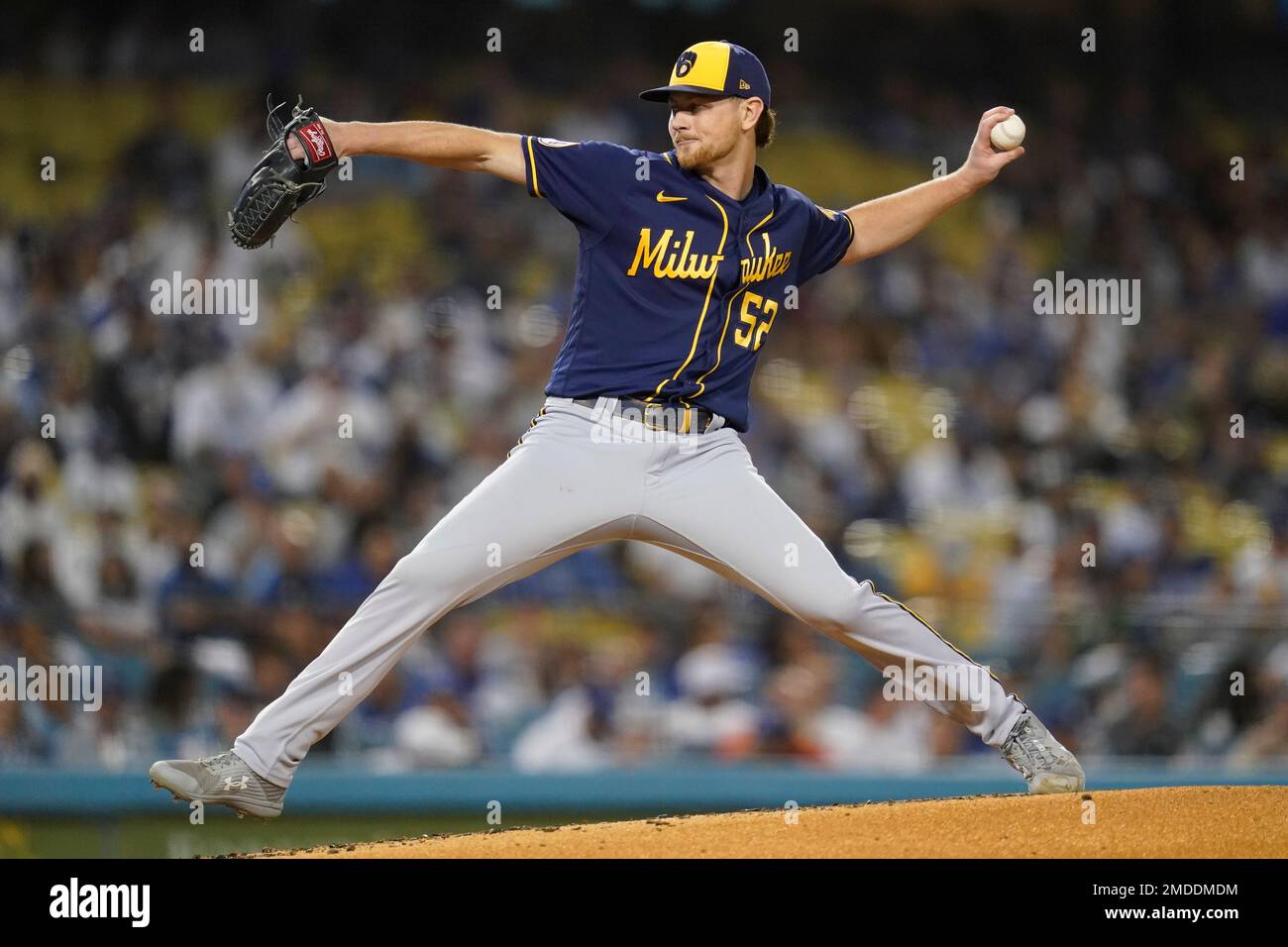 Milwaukee Brewers starting pitcher Eric Lauer (52) throws during the ...