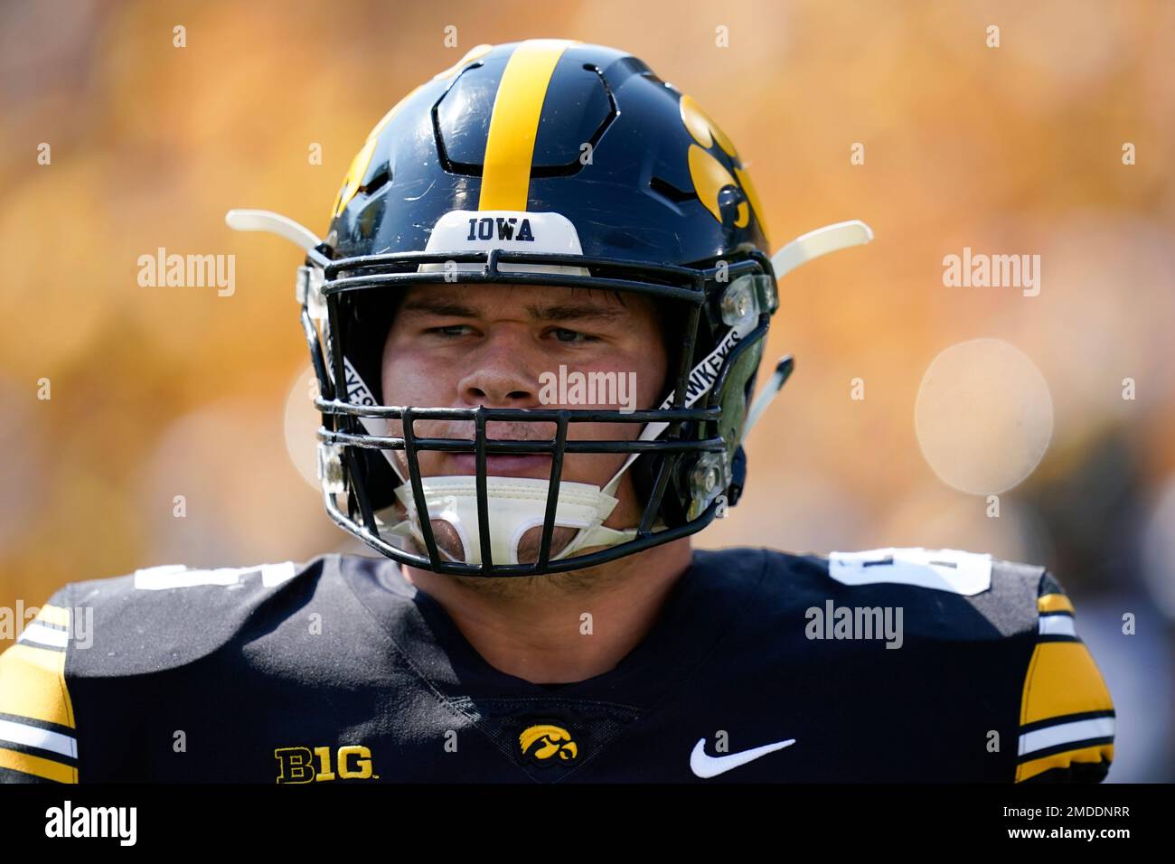 Iowa offensive lineman Tyler Linderbaum (65) warms up before an NCAA ...
