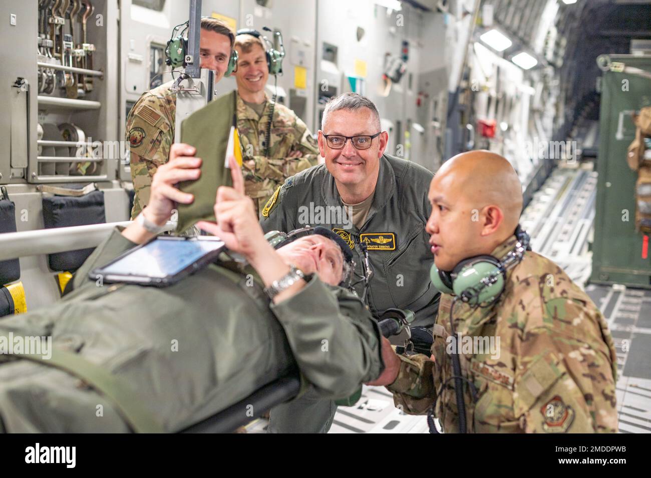 U.S. Air Force Col. Corey Simmons, center, 60th Air Mobility Wing ...