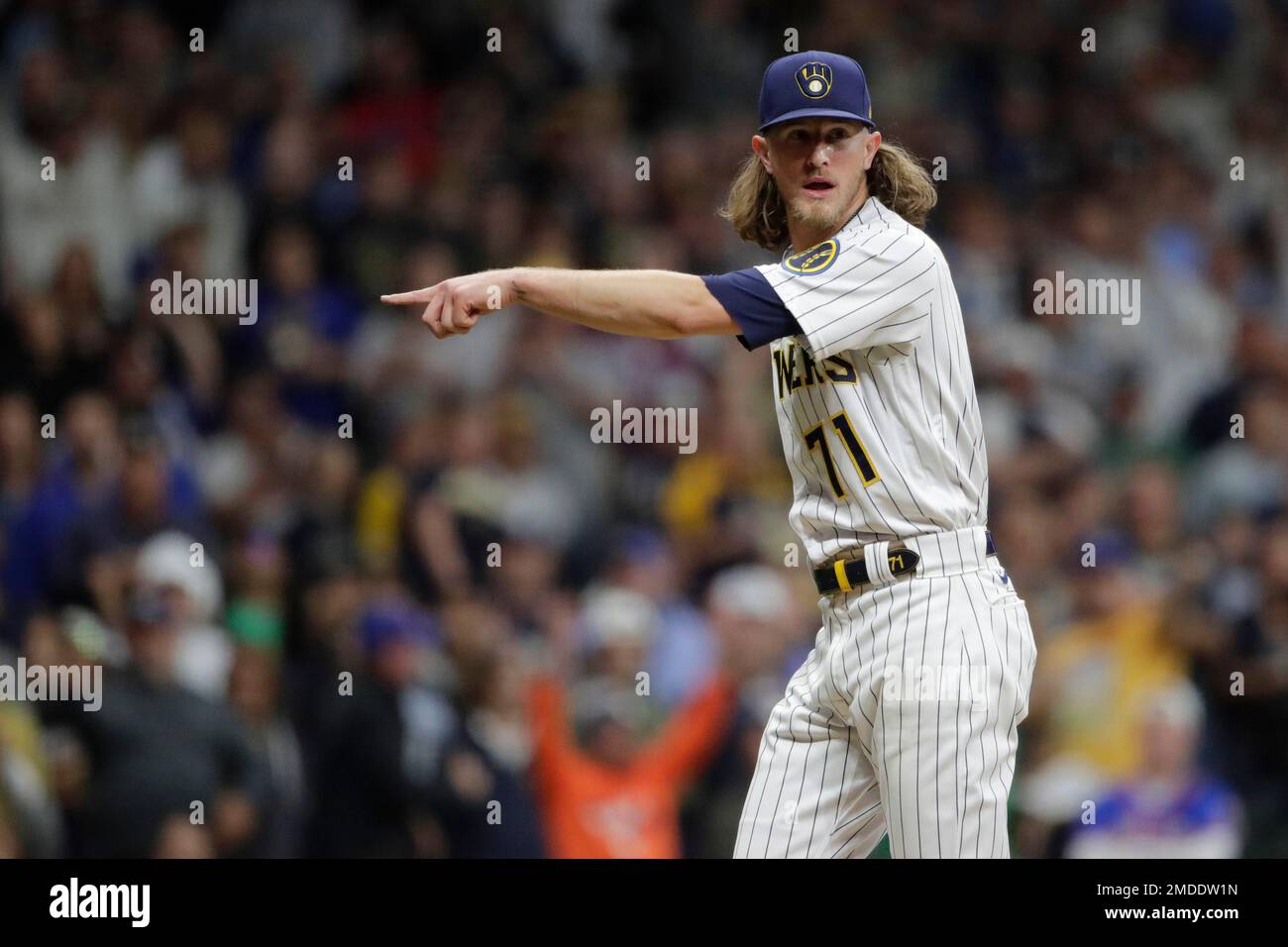 Milwaukee Brewers' Josh Hader points during the ninth inning of a ...